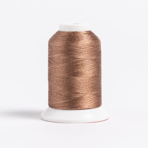 brown thread and needle